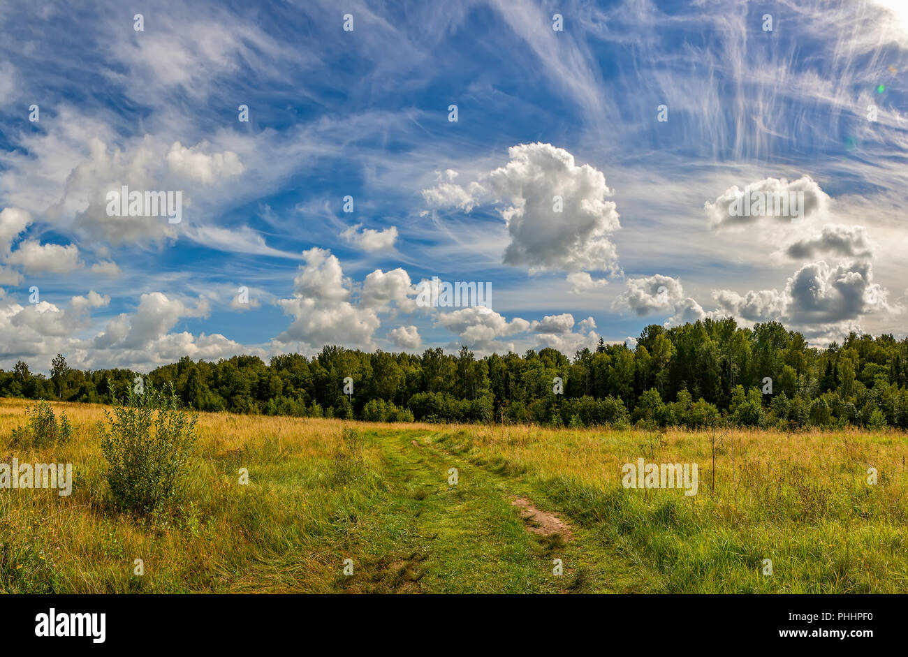 Landscape with clouds in the summer sky. The last days of August Stock ...