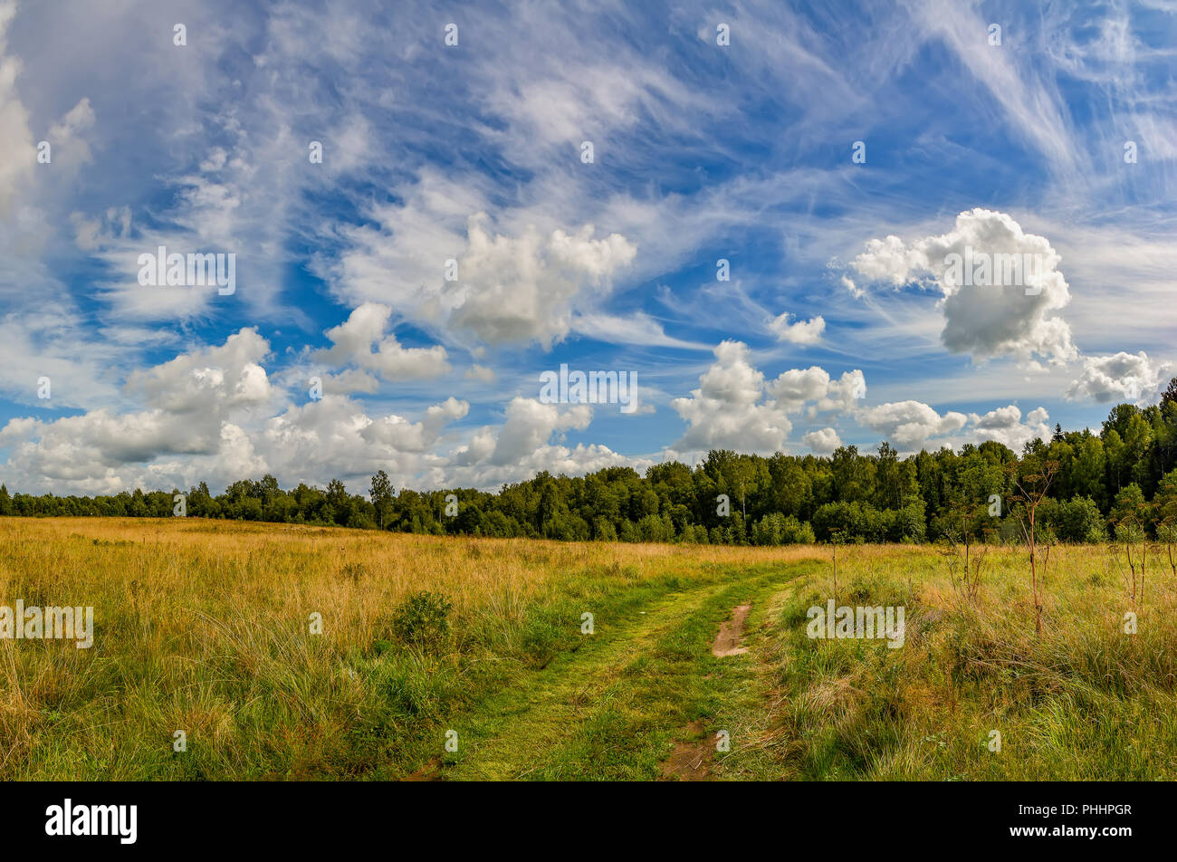 Landscape with clouds in the summer sky. The last days of August Stock ...