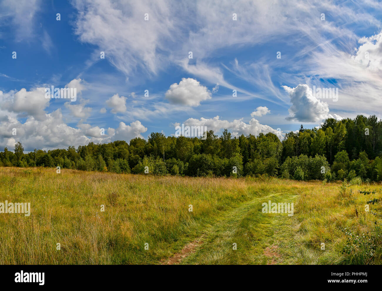 Landscape with clouds in the summer sky. The last days of August Stock ...