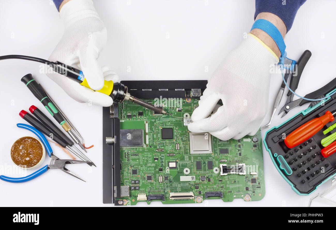Repair of the digital printed circuit board concept Stock Photo - Alamy