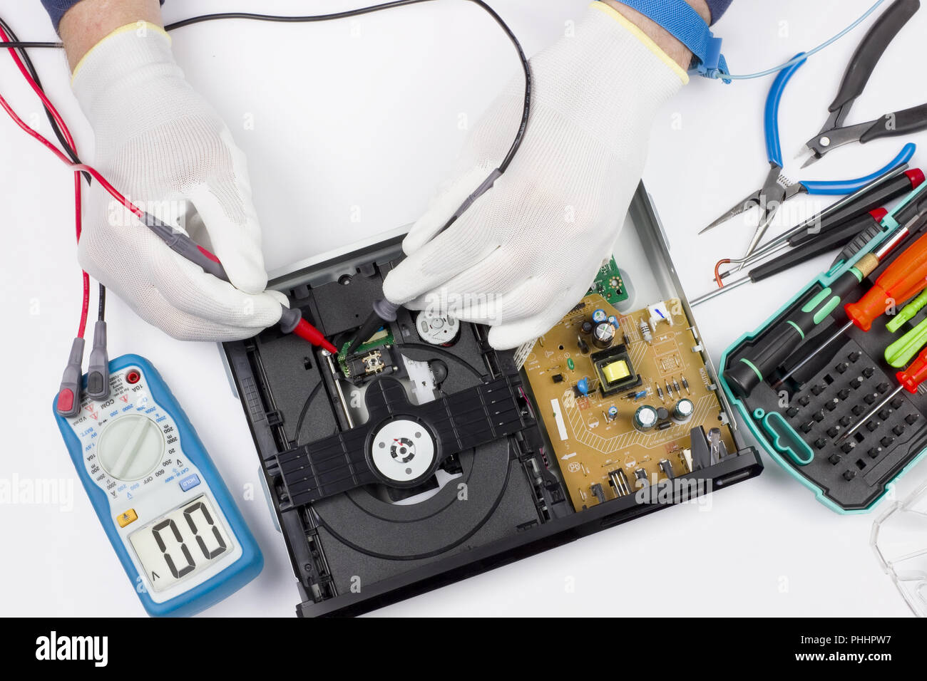 Repair of the modern dvd player Stock Photo - Alamy