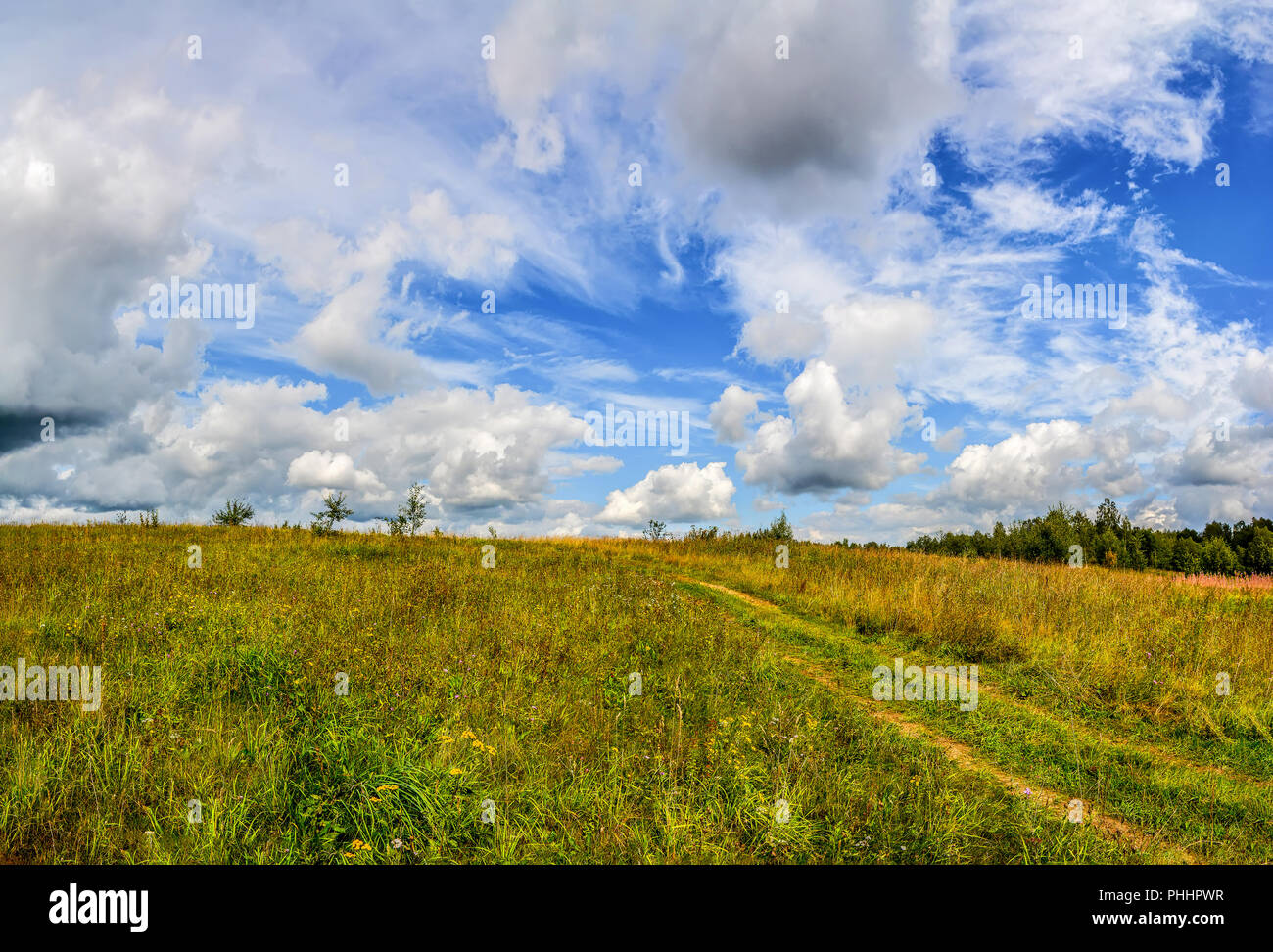 Landscape with clouds in the summer sky. The last days of August Stock ...