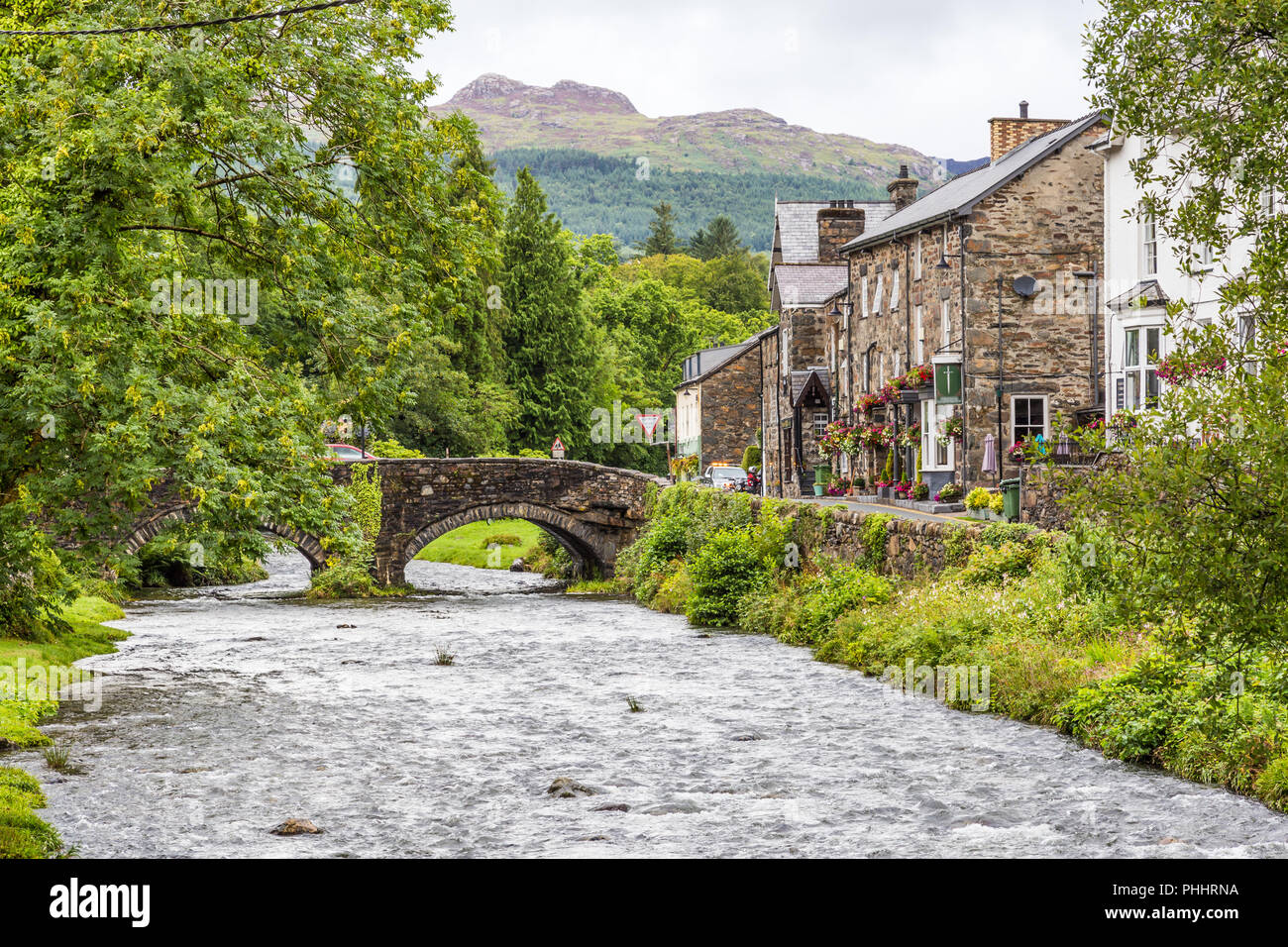 Beddgelert town in Snowdonia NP, Wales, UK Stock Photo - Alamy