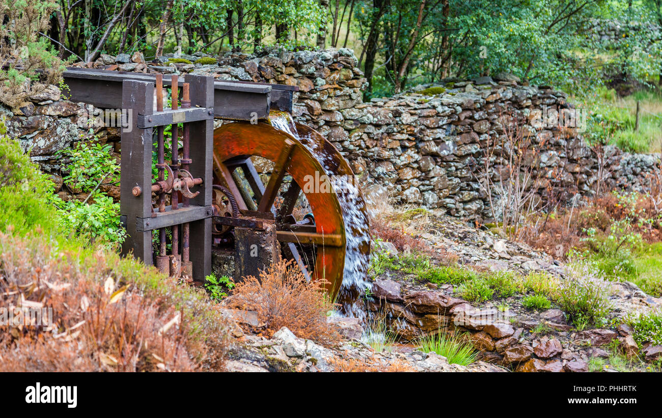 Iron Water wheel in Wales, UK Stock Photo - Alamy