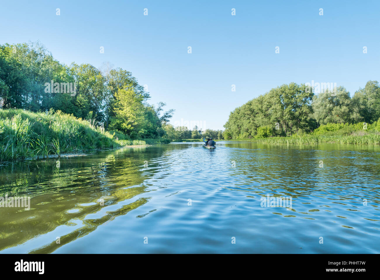 Calm landscape with blue river Stock Photo - Alamy