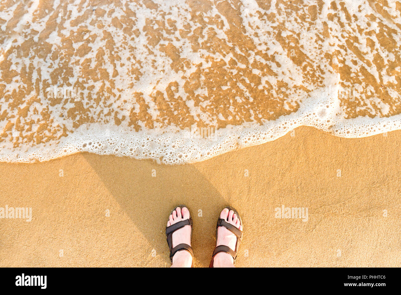 Feet on beach shore hi-res stock photography and images - Alamy
