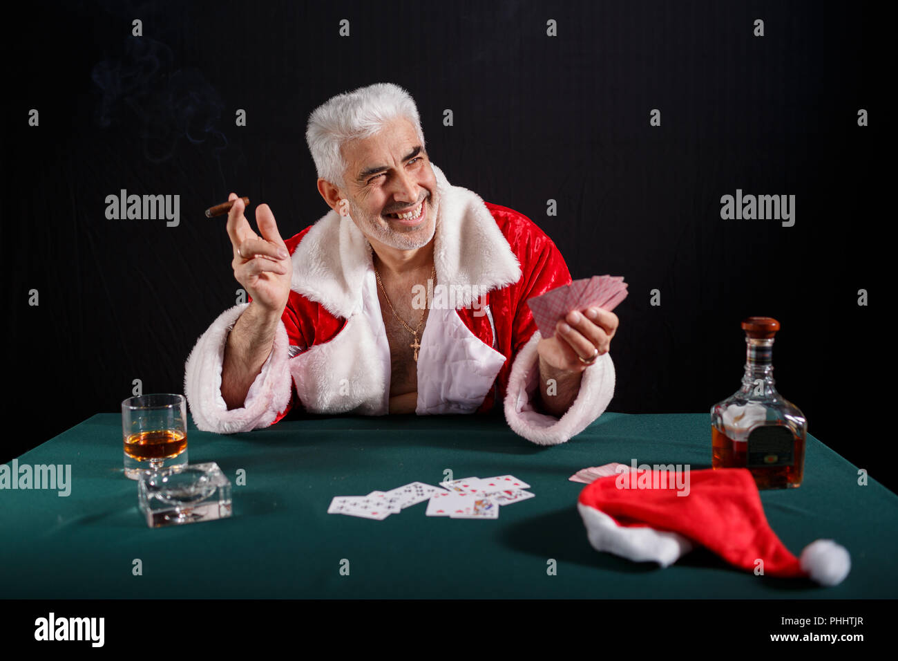 Santa claus playing cards hi-res stock photography and images - Alamy