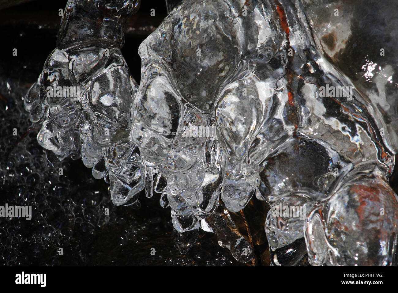 Ice at the creek Stock Photo - Alamy
