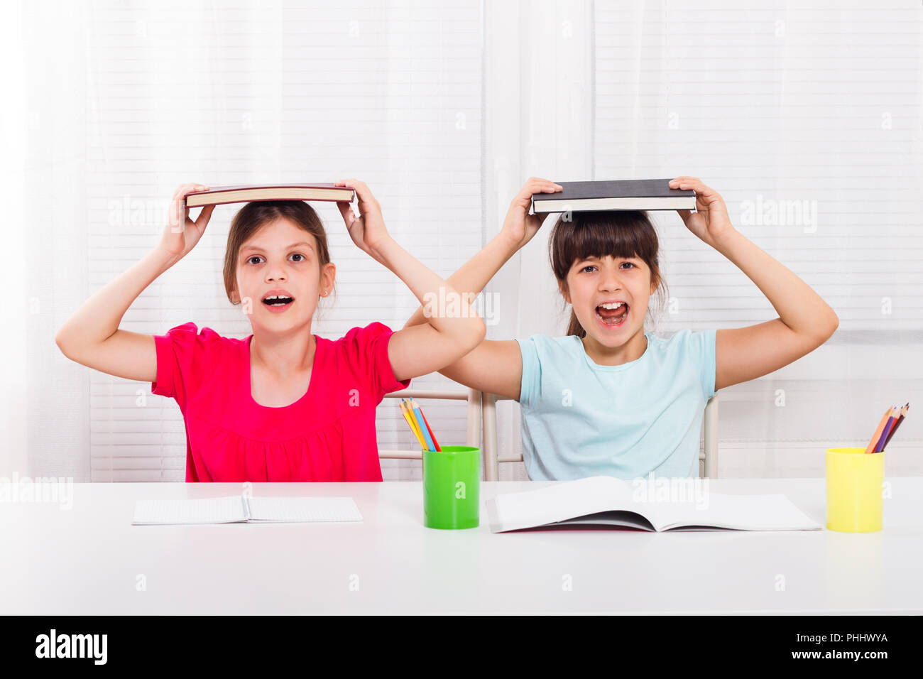 Angry little girls are screaming because they must stay at home and do ...