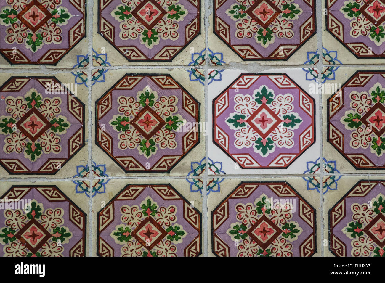 Restoration of tiles with different age Stock Photo - Alamy
