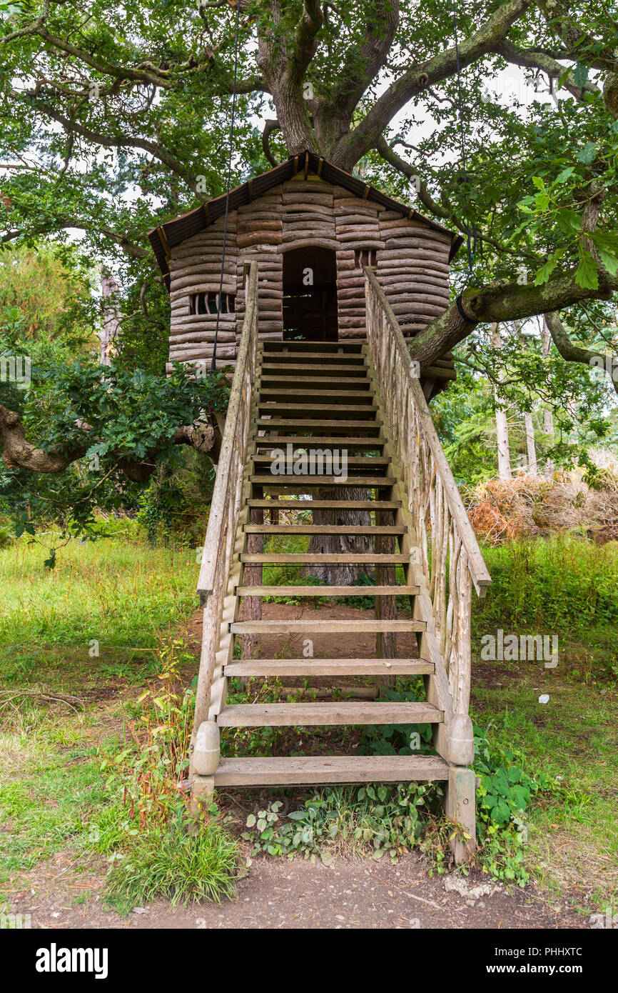 Cozy little playhouse in a tree Stock Photo - Alamy