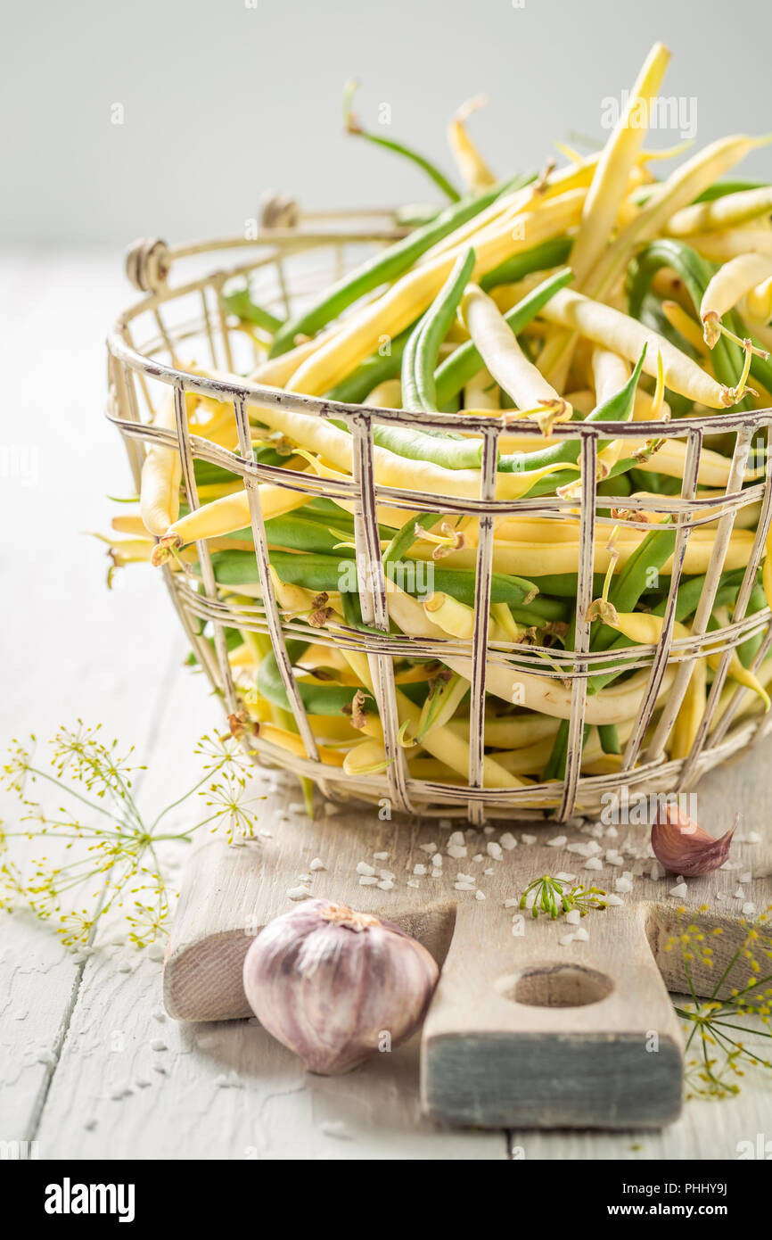 Homemade canned green and yellow beans on blue table Stock Photo - Alamy