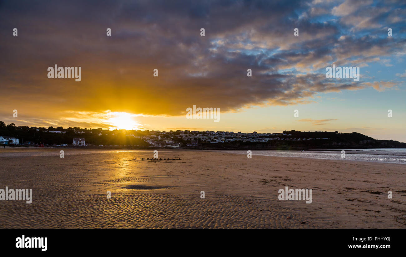 Sunset at the beach, Wales, UK Stock Photo - Alamy