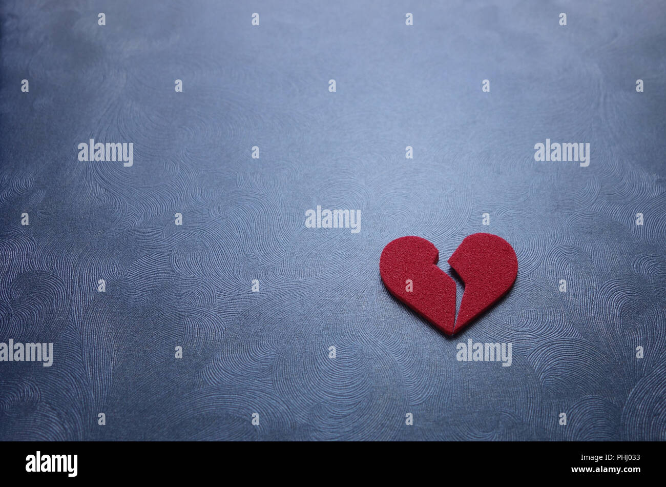 Blue and red broken heart hi-res stock photography and images - Alamy
