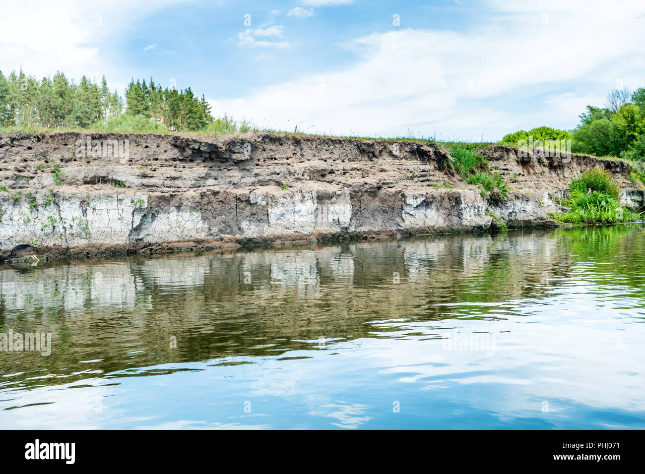 Calm landscape with blue river Stock Photo - Alamy