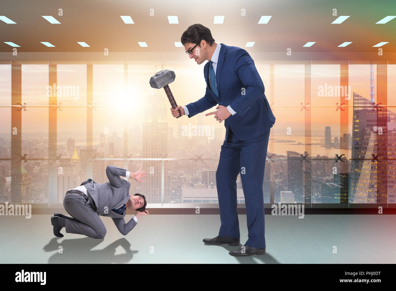 Bad angry boss threatening employee with hammer Stock Photo - Alamy