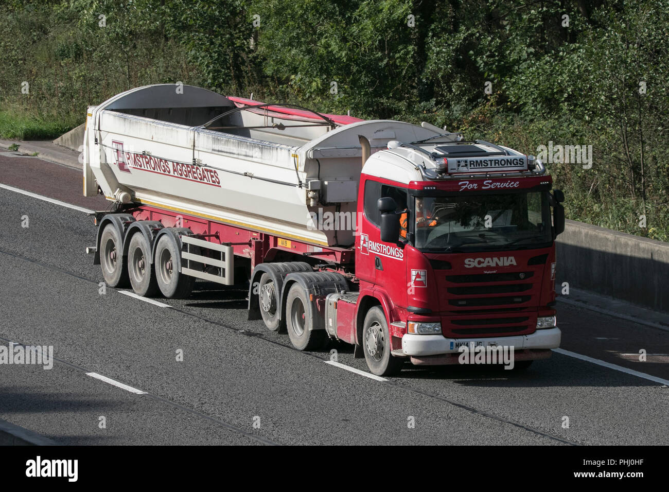 Heavy goods lorries logistics transport vehicles on the M6 at Lancaster ...