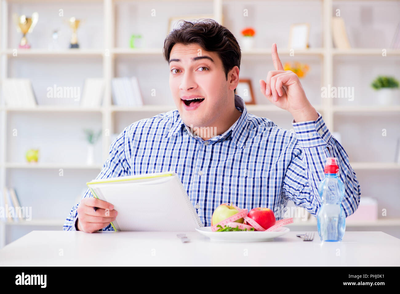 Man on special diet programm to lose weight Stock Photo - Alamy