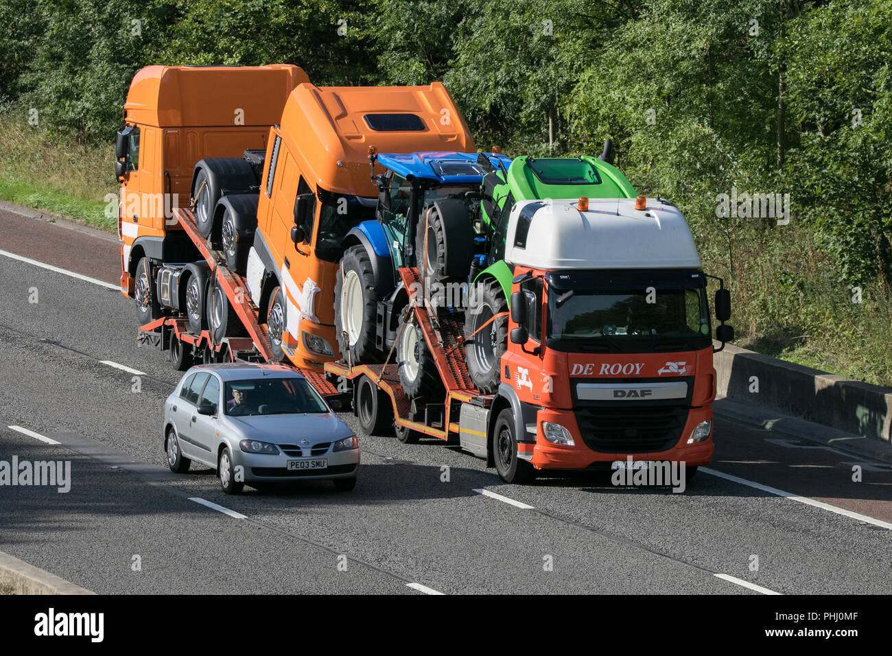 Heavy goods lorries logistics transport vehicles on the M6 at Lancaster ...
