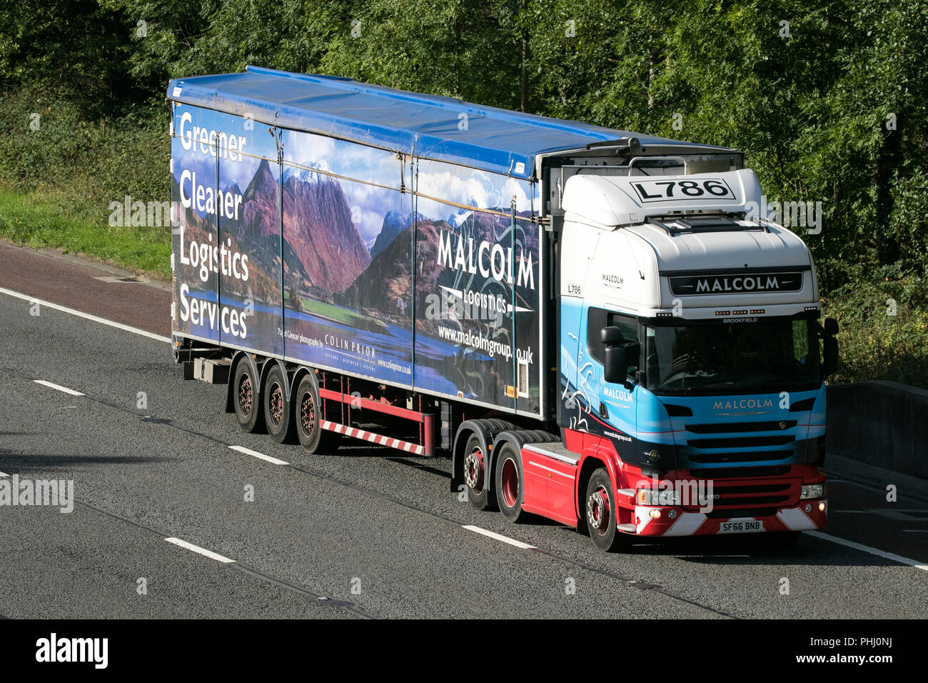 Heavy goods lorries logistics transport vehicles on the M6 at Lancaster ...