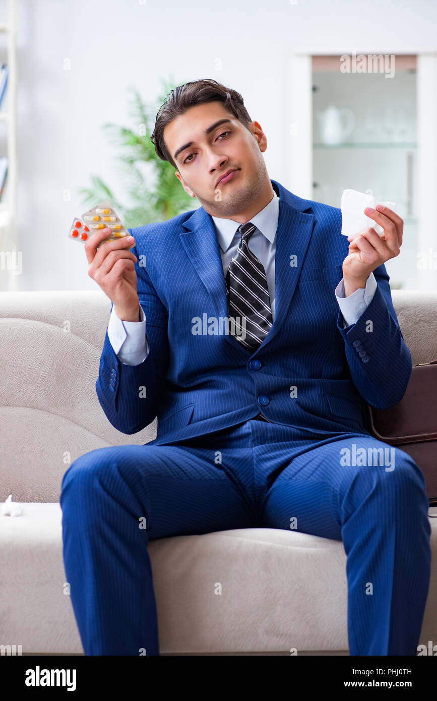 Sick employee staying at home suffering from flue Stock Photo - Alamy