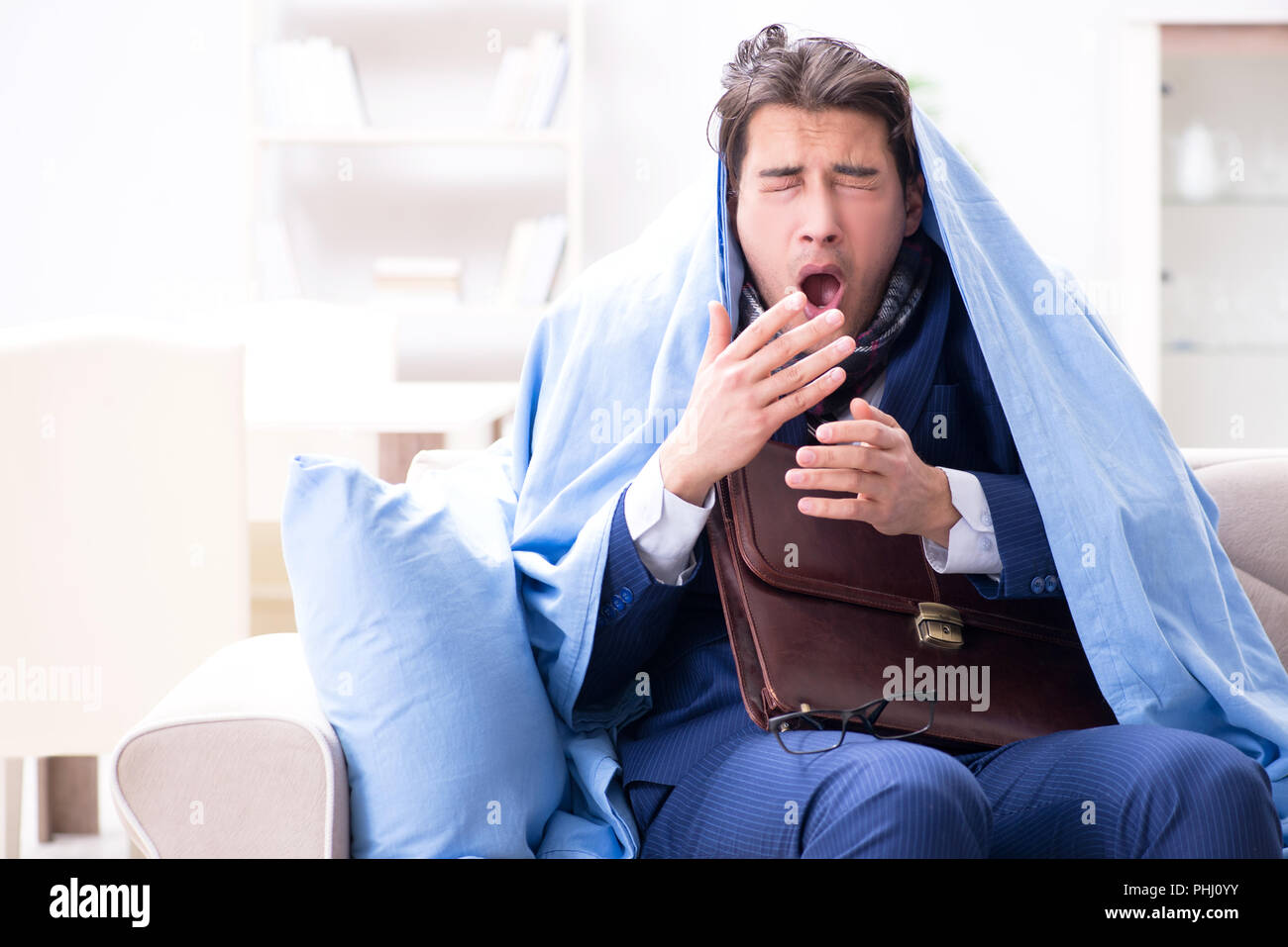 Sick employee staying at home suffering from flue Stock Photo - Alamy