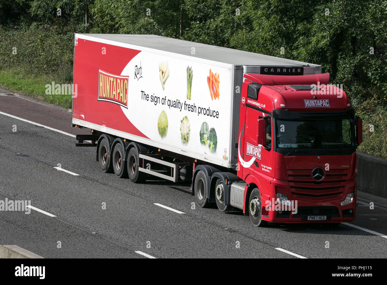 Heavy goods lorries logistics transport vehicles on the M6 at Lancaster ...