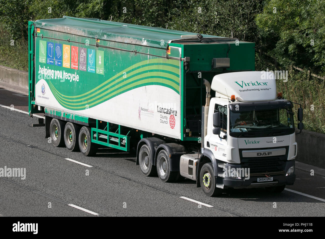 Heavy goods lorries logistics transport vehicles on the M6 at Lancaster ...
