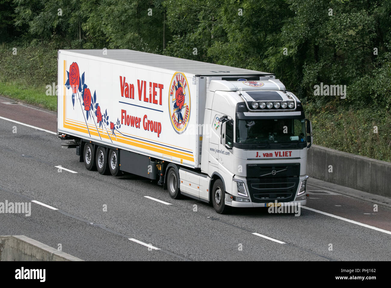 Heavy goods lorries logistics transport vehicles on the M6 at Lancaster ...