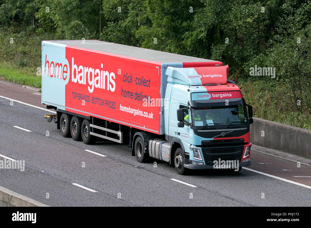 Heavy goods lorries logistics transport vehicles on the M6 at Lancaster ...