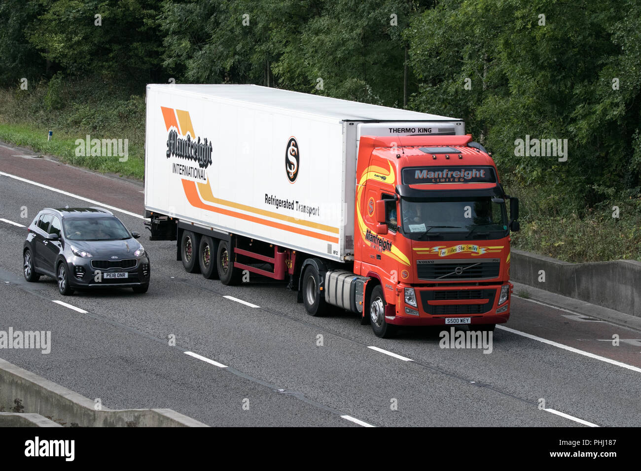 Heavy goods lorries logistics transport vehicles on the M6 at Lancaster ...