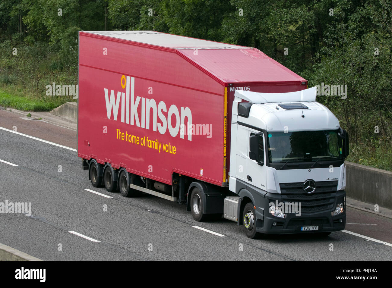 Heavy goods lorries logistics transport vehicles on the M6 at Lancaster ...