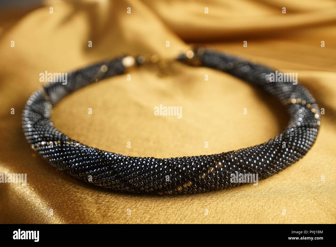 Close up of bead rope, seed beads, bead necklace. Black bead necklace ...