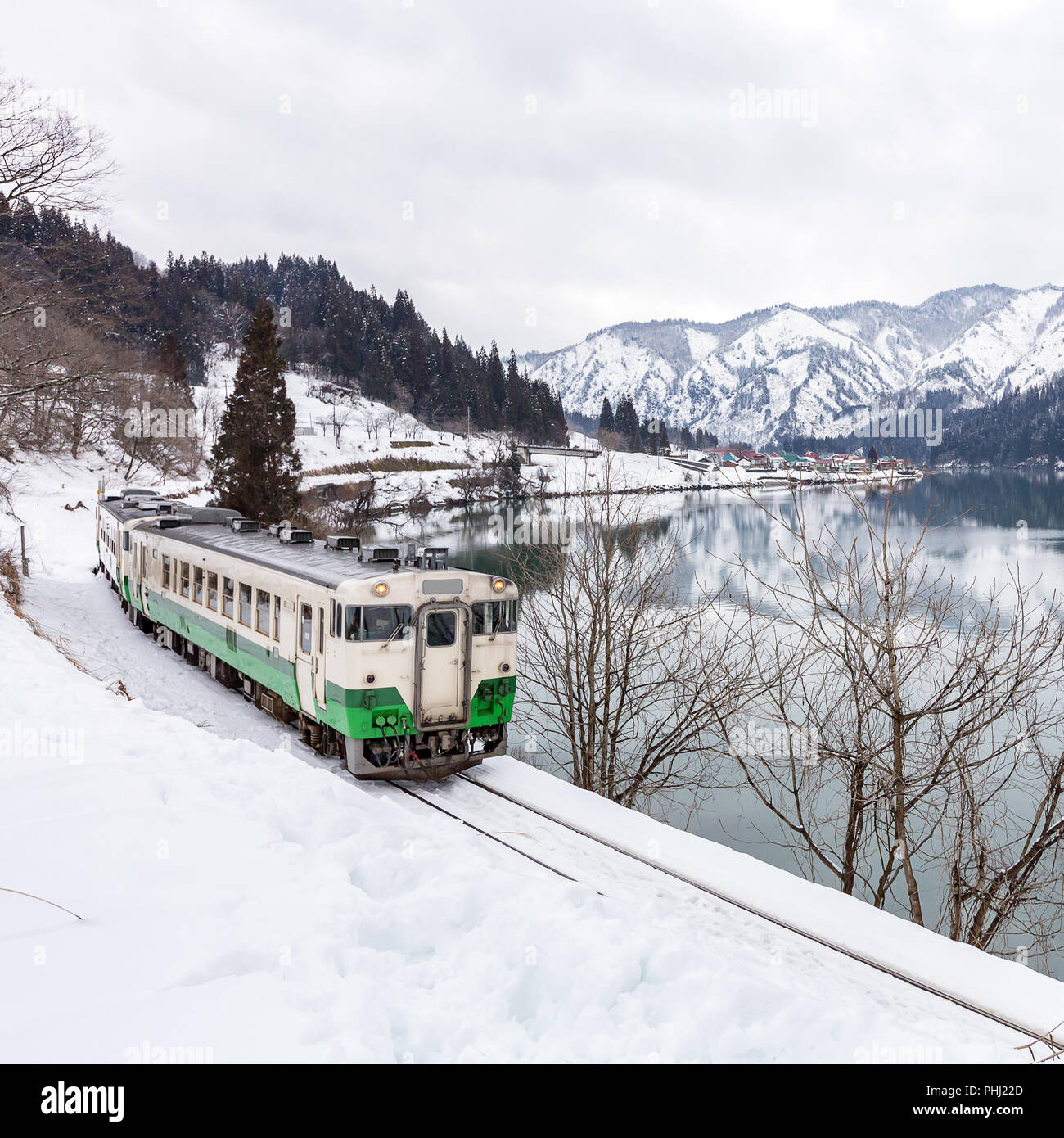 Train in Winter landscape snow Stock Photo - Alamy
