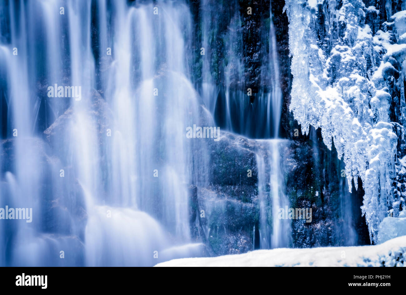 Magical blue waterfall Stock Photo - Alamy