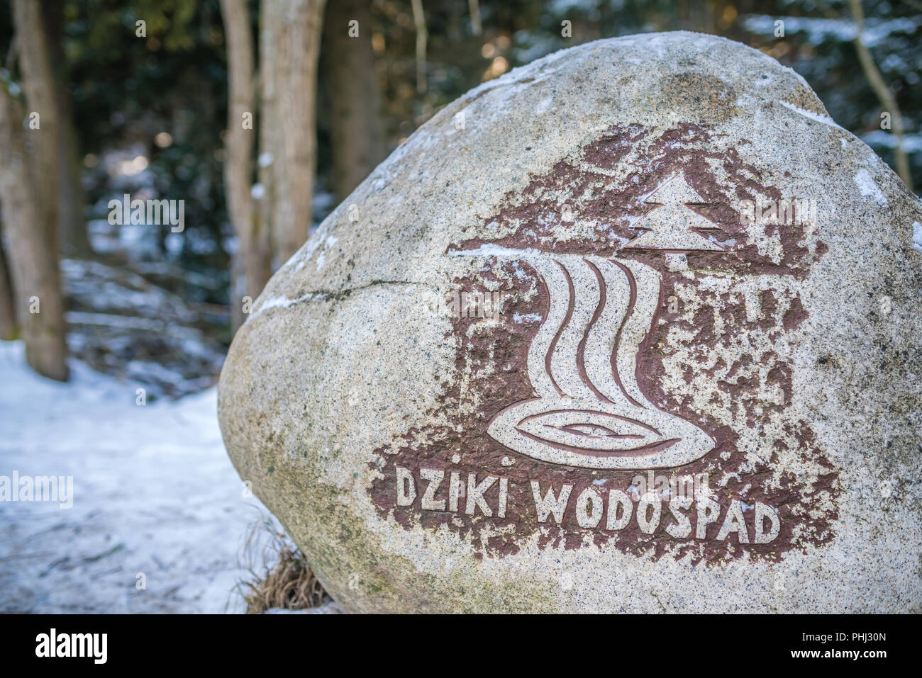 Stone mark near Wild Waterfall Stock Photo - Alamy