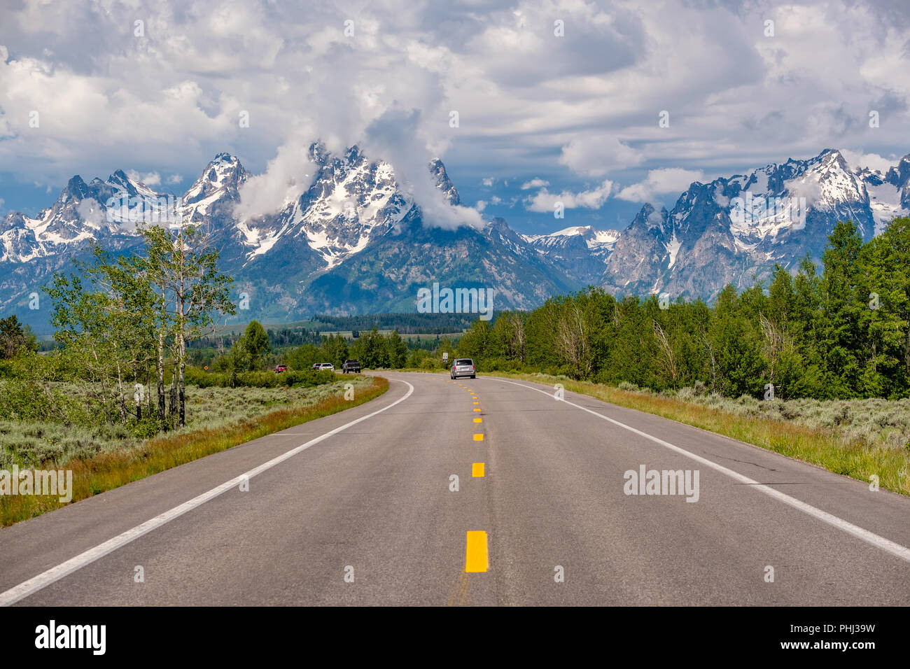 Highway in Grand Teton National Park Stock Photo - Alamy