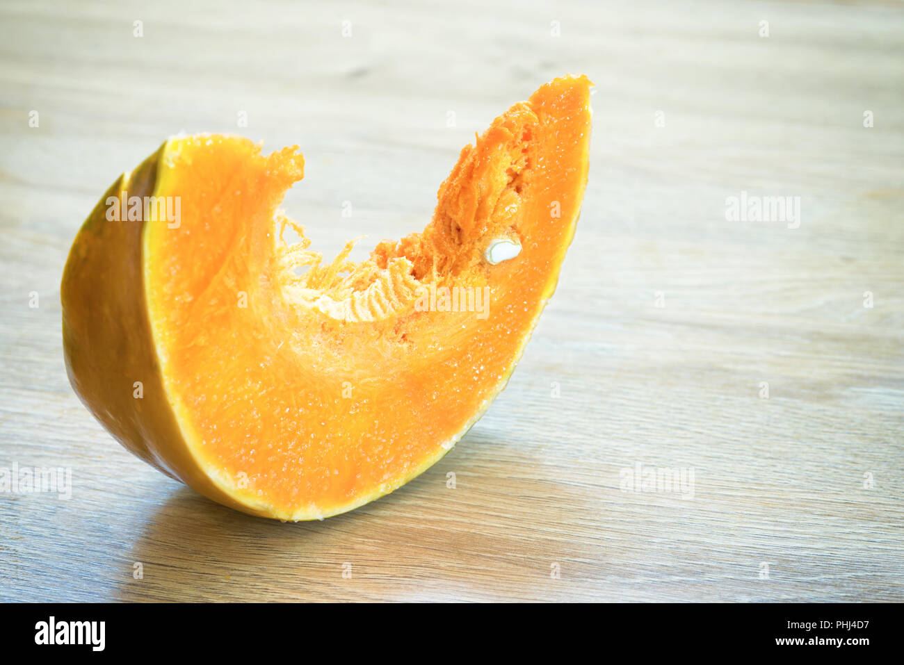 Slice of orange ripe pumpkin Stock Photo - Alamy