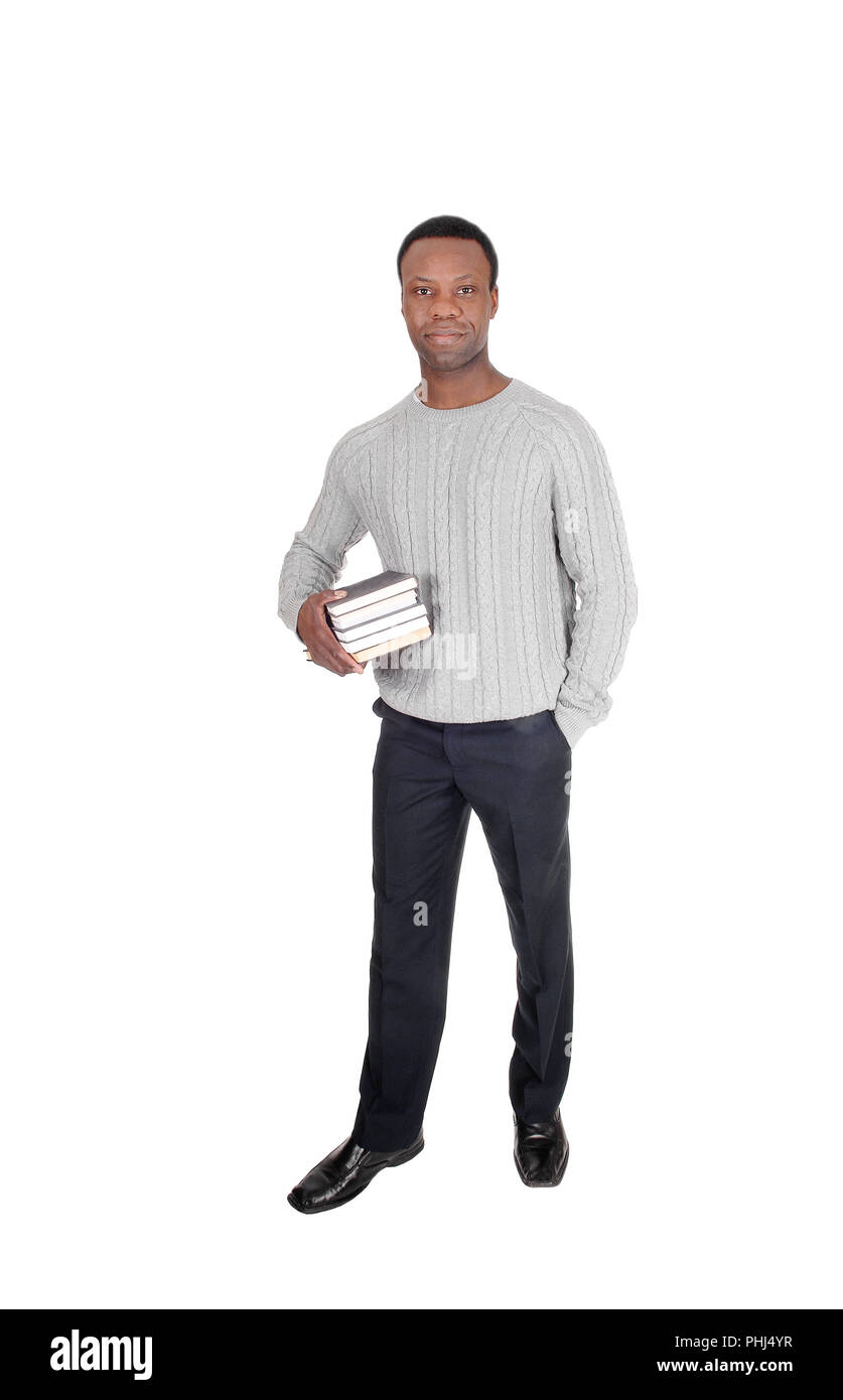 African man standing with books in his hands Stock Photo - Alamy