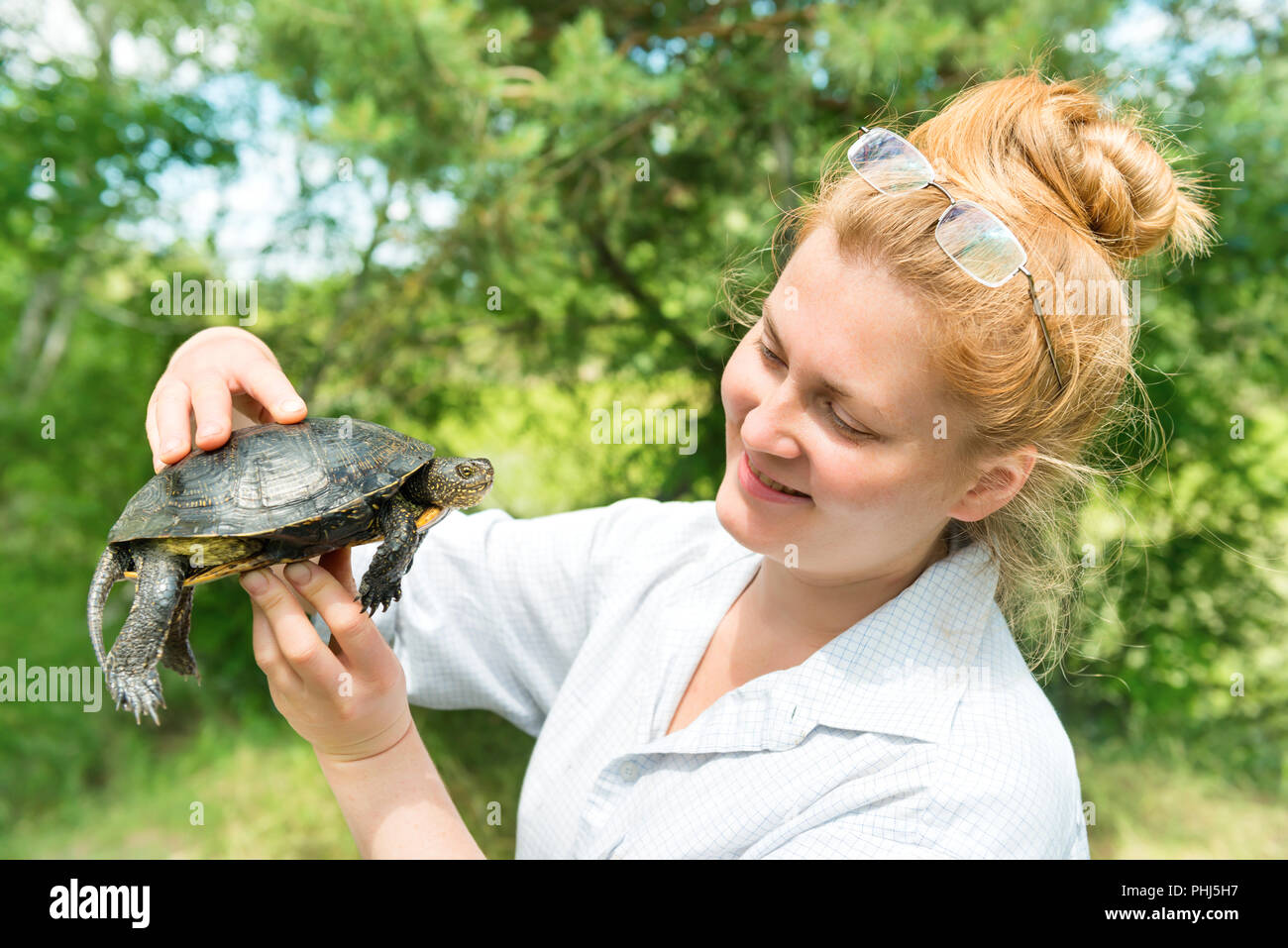 Woman turtle hi-res stock photography and images - Alamy