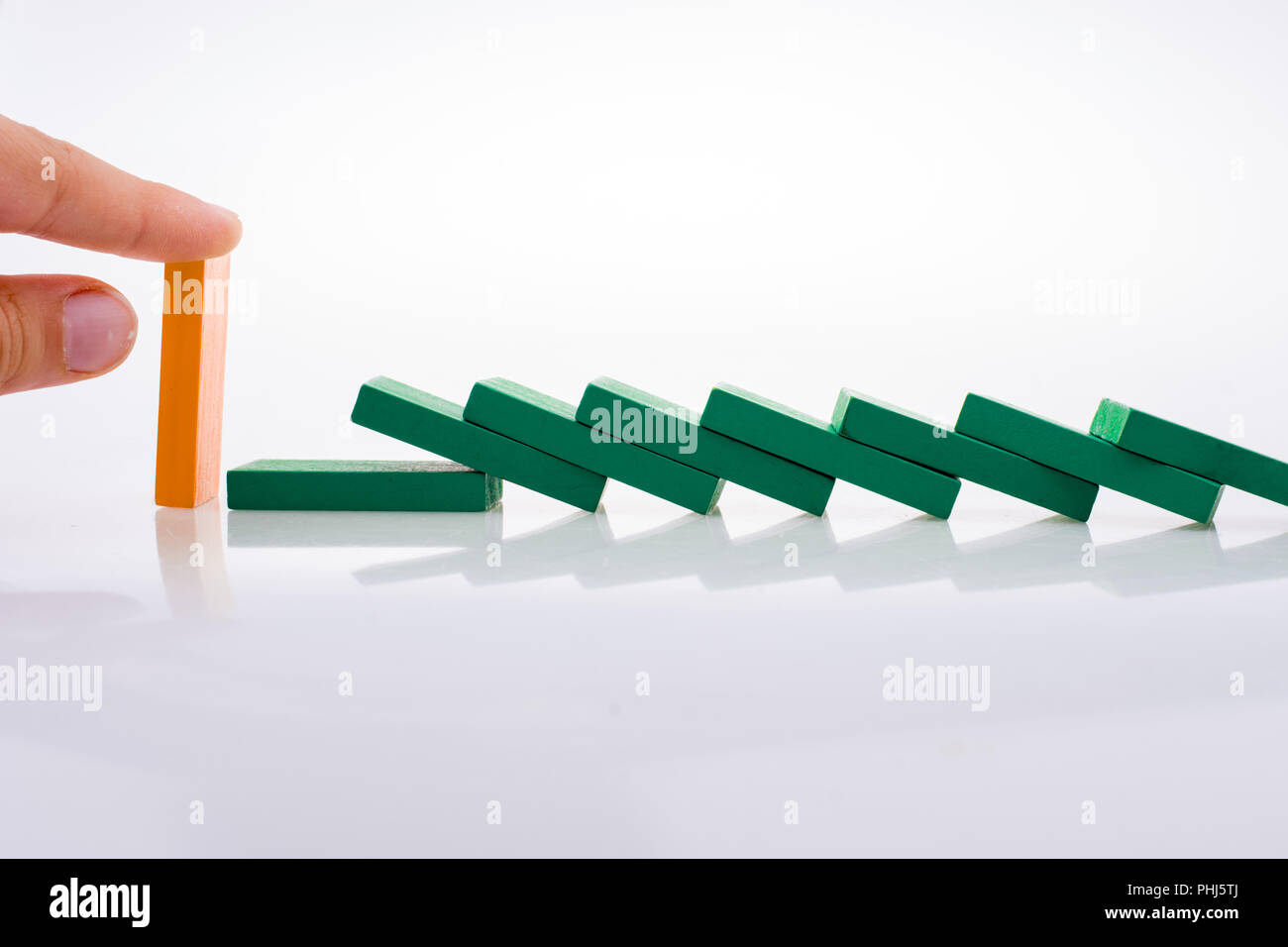 Colorful Domino Blocks in a line on a white background Stock Photo - Alamy