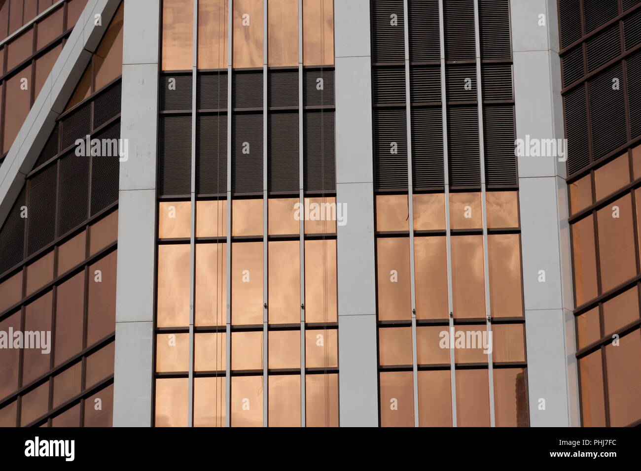 Exterior windows of a commercial office building Stock Photo - Alamy