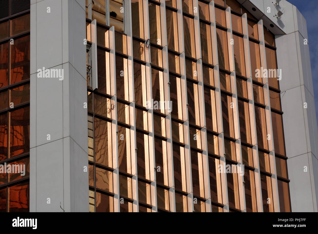 Exterior windows of a commercial office building Stock Photo - Alamy