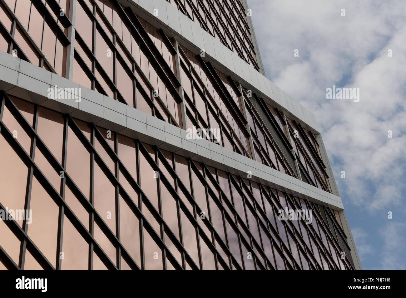 Exterior windows of a commercial office building Stock Photo - Alamy