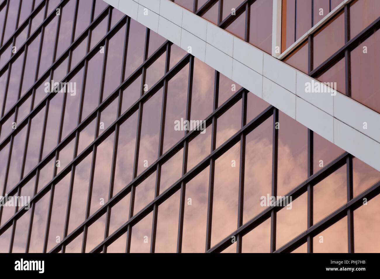 Exterior windows of a commercial office building Stock Photo - Alamy