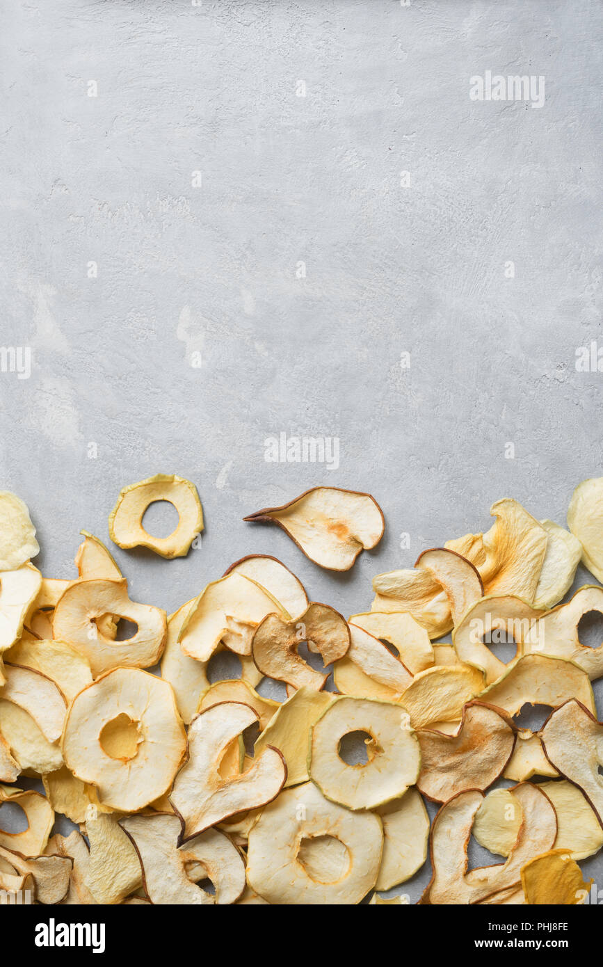 Various fruit chips as background, copy space. Assorted dehydrated ...