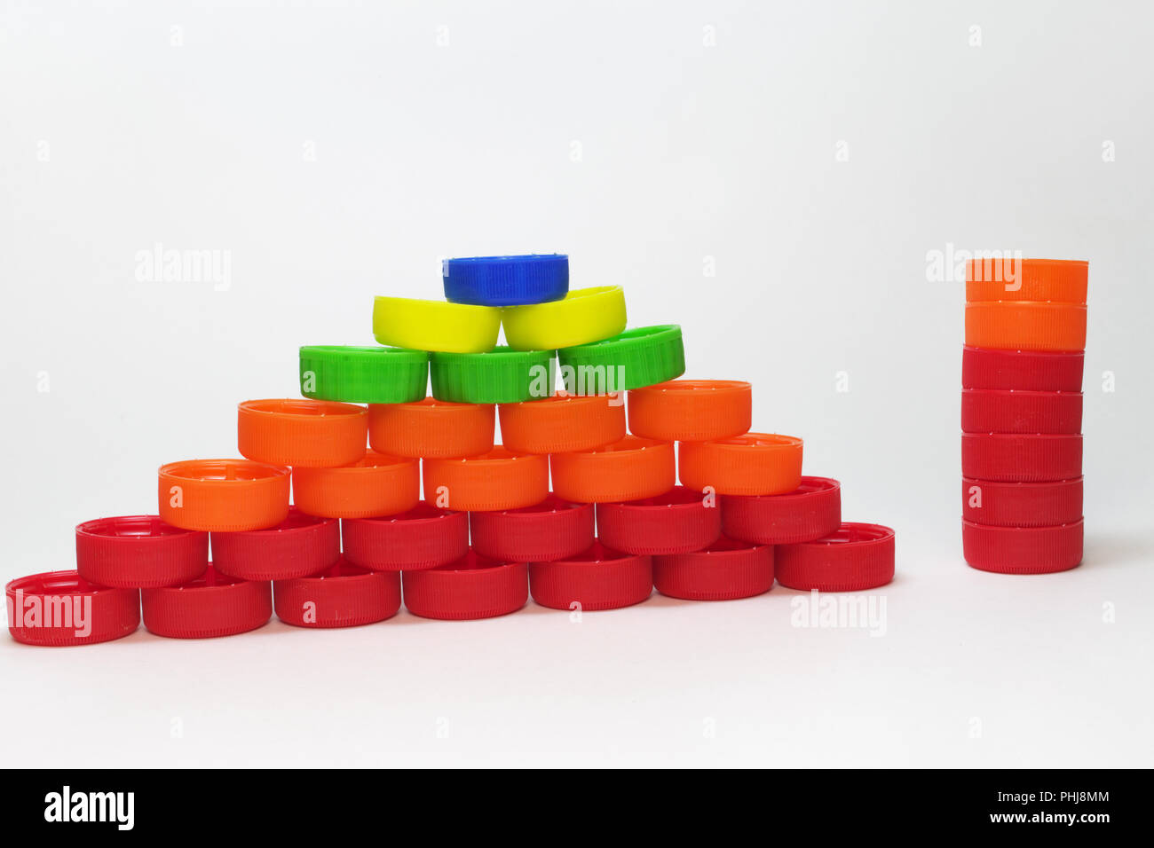 pyramid made out of plastic ribbed bottle caps and column of the same ...