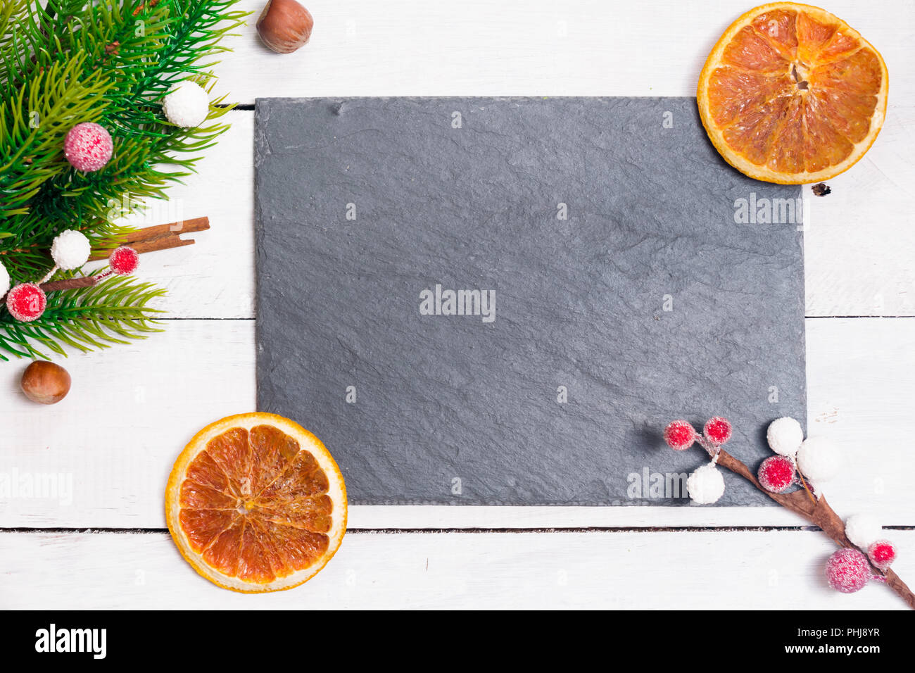 Christmas fir branches with different decoration - citrus slices ...