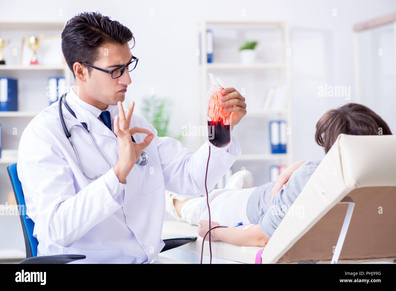 Patient getting blood transfusion in hospital clinic Stock Photo - Alamy