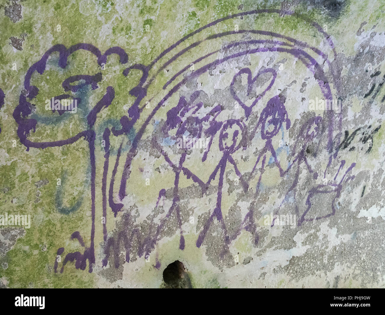 Kids' graffiti on the arched wall of a road pedestrian undercut Stock ...
